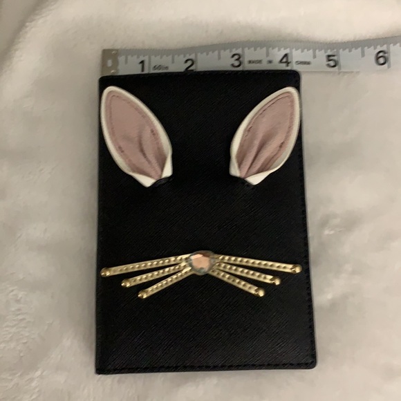 kate spade | Bags | Kate Spade Rabbit Passport Wallet | Poshmark